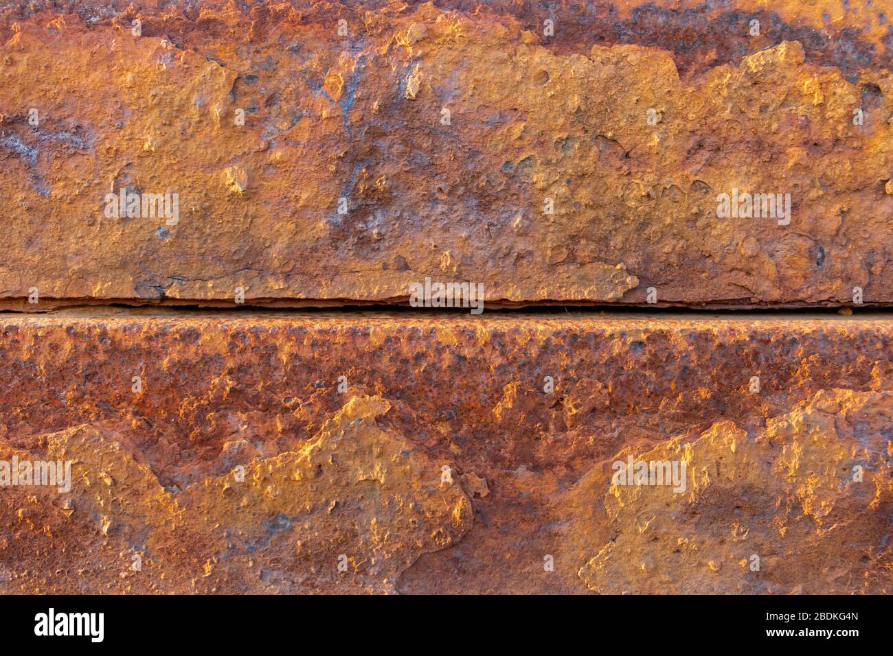 Heavily rusted and corroded metal sheet in an industrial area, suitable ...
