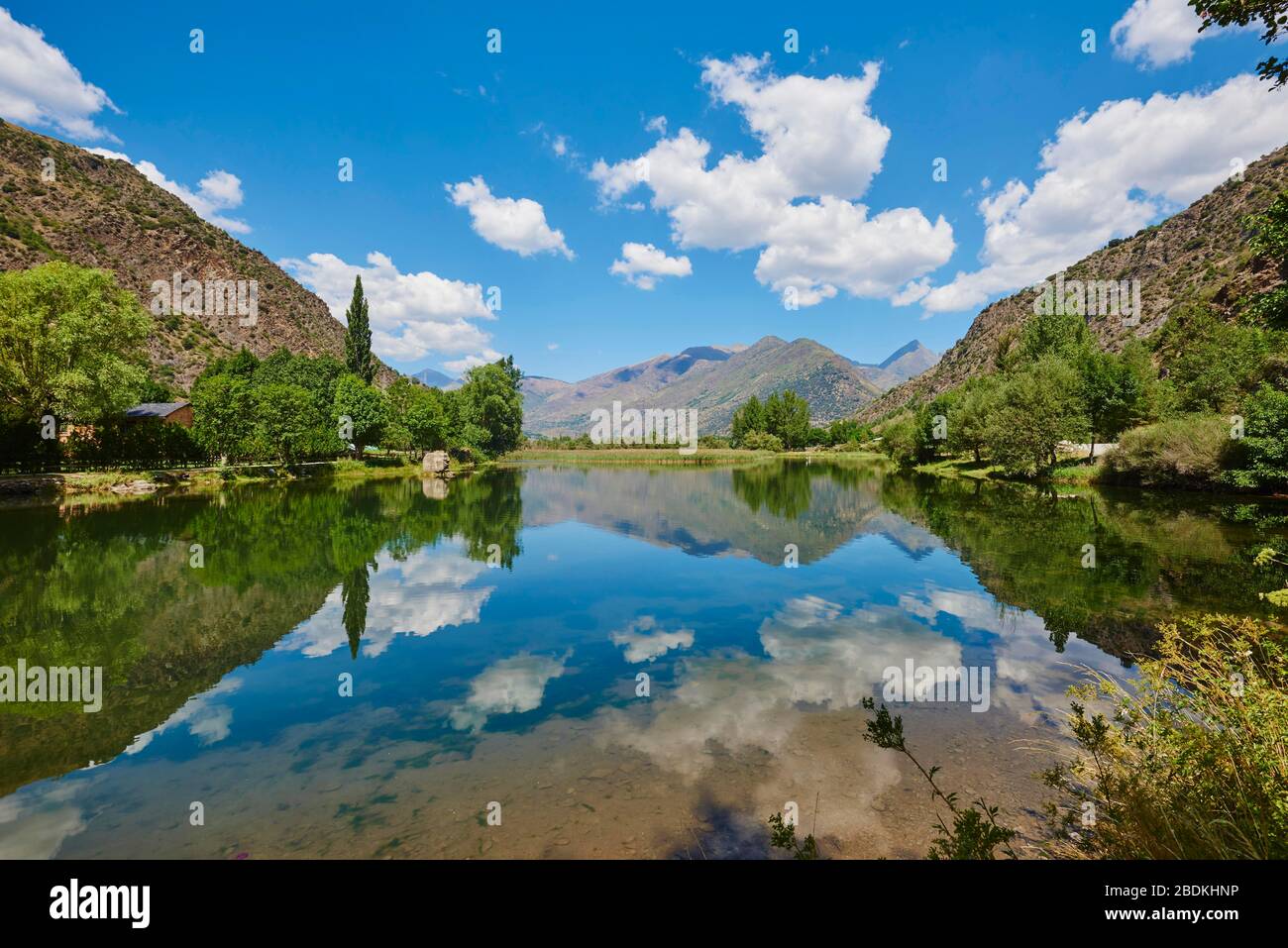 Lake Panta de la Torrassa in the mountains, Pyrenees, Lleida province ...