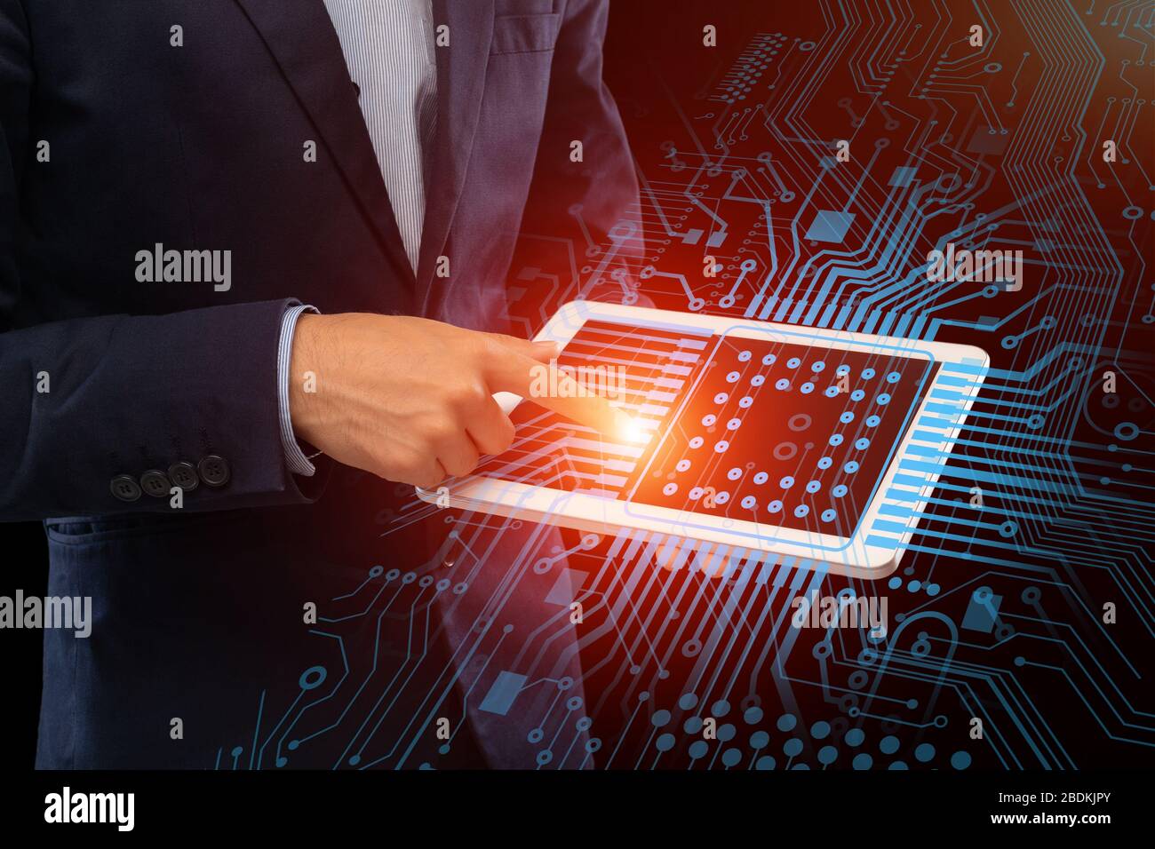 Futuristic technologies. Businessman pressing shiny integrated circuit ...