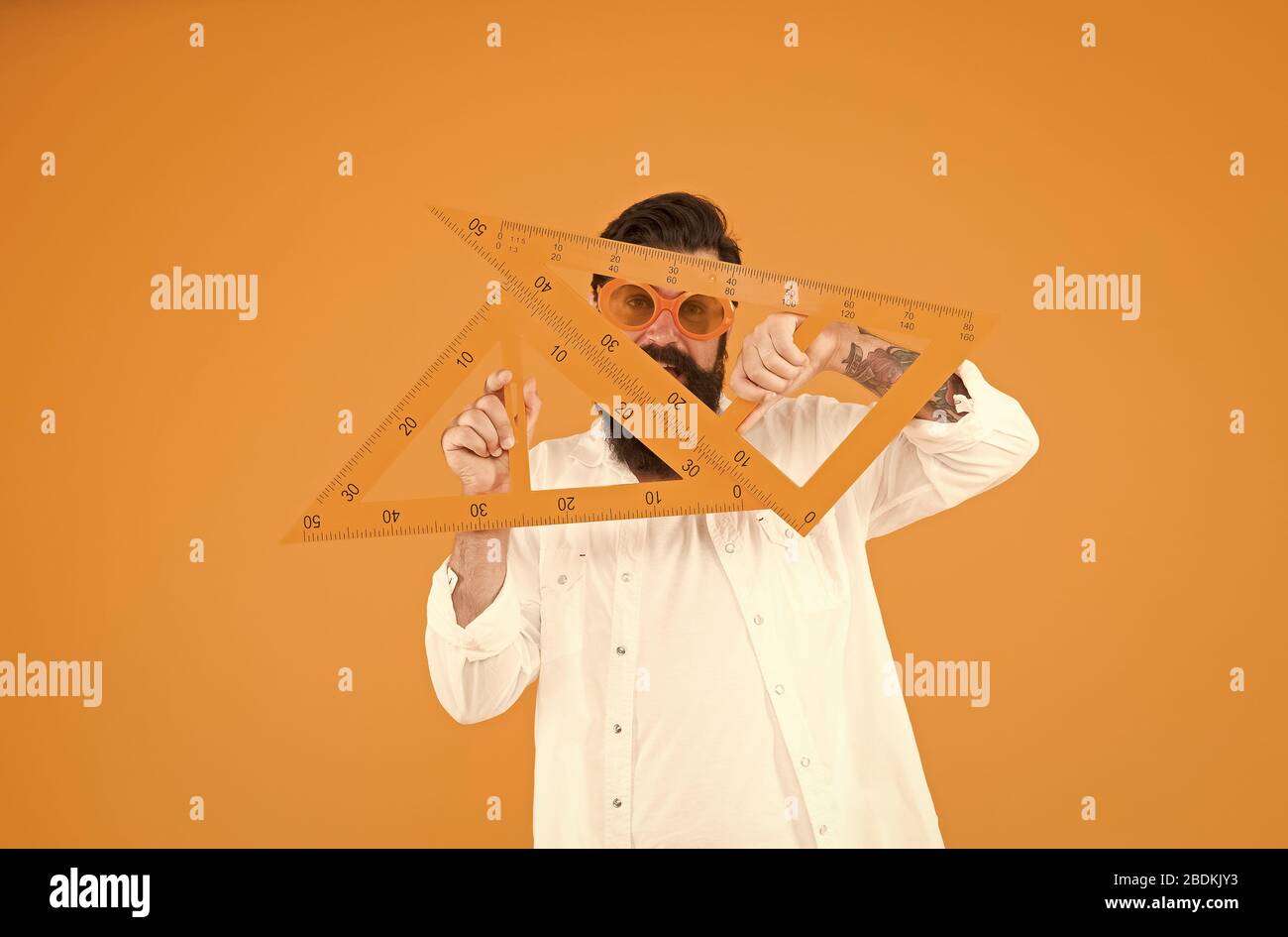 Student using measuring instrument. Engineering architecture faculty ...