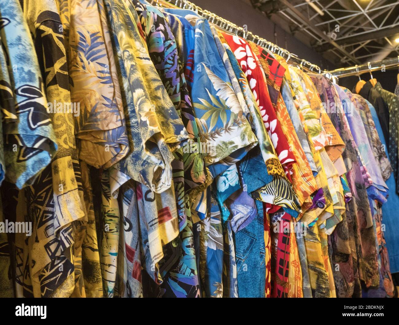 Hawaiian summer clothes displayed at flea market Stock Photo - Alamy