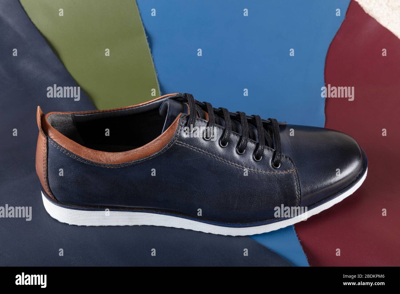 handmade leather men shoes on colored background. men fashion show on ...