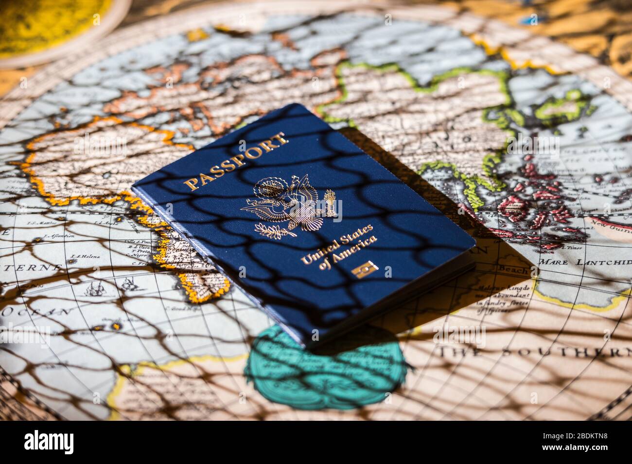 us passport on ancient world map Stock Photo - Alamy