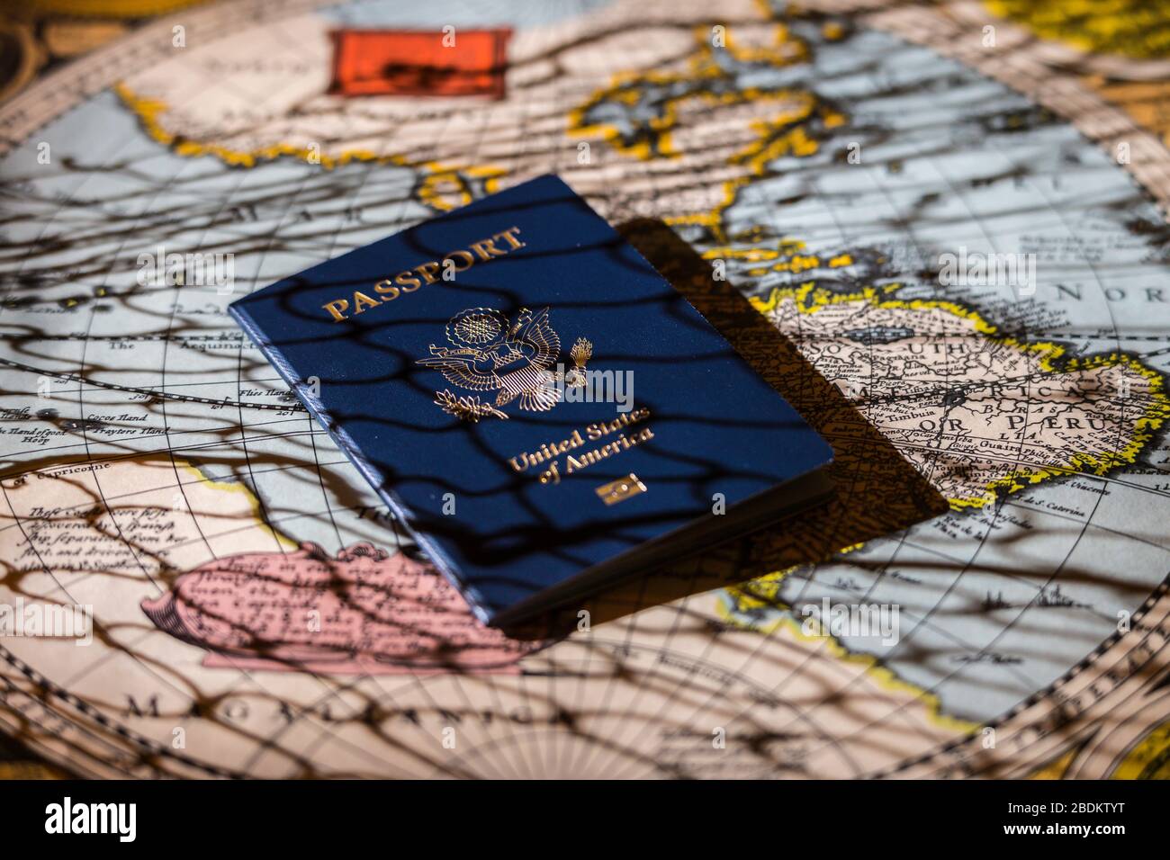 us passport on ancient world map Stock Photo - Alamy