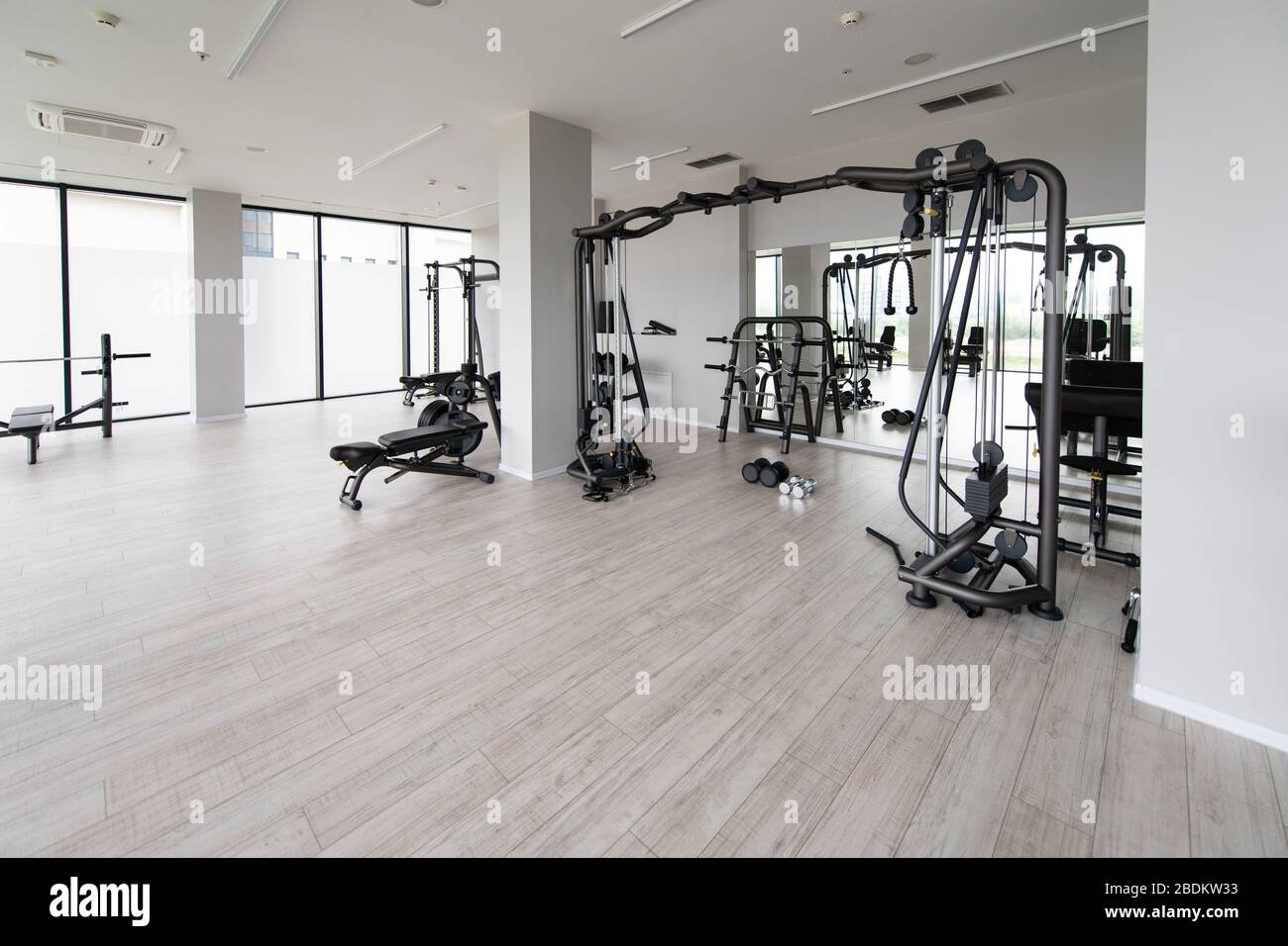 Modern Gym Room Fitness Center With Equipment And Machines Stock Photo ...