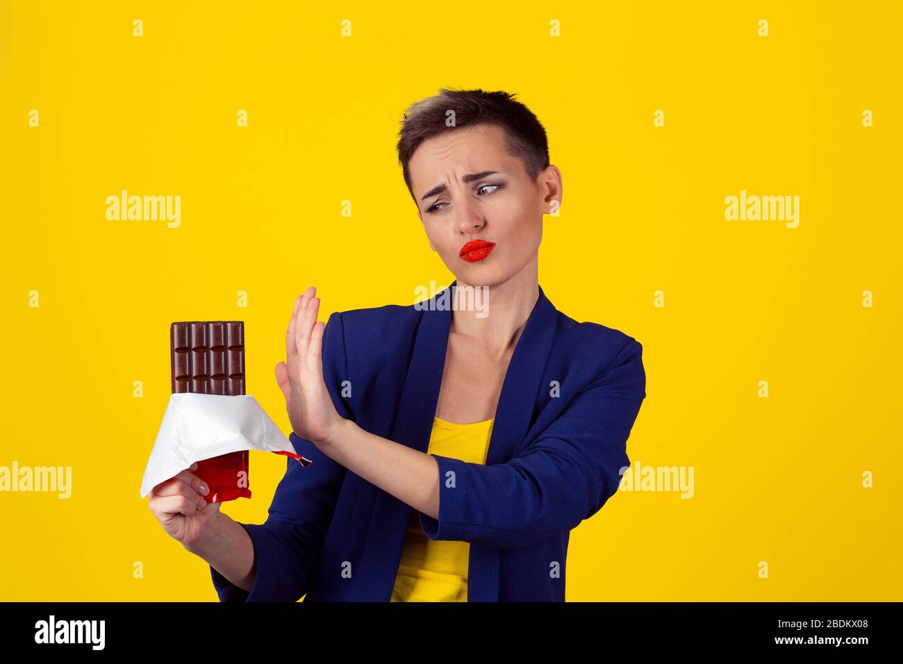 Woman refuse chocolate hi-res stock photography and images - Alamy