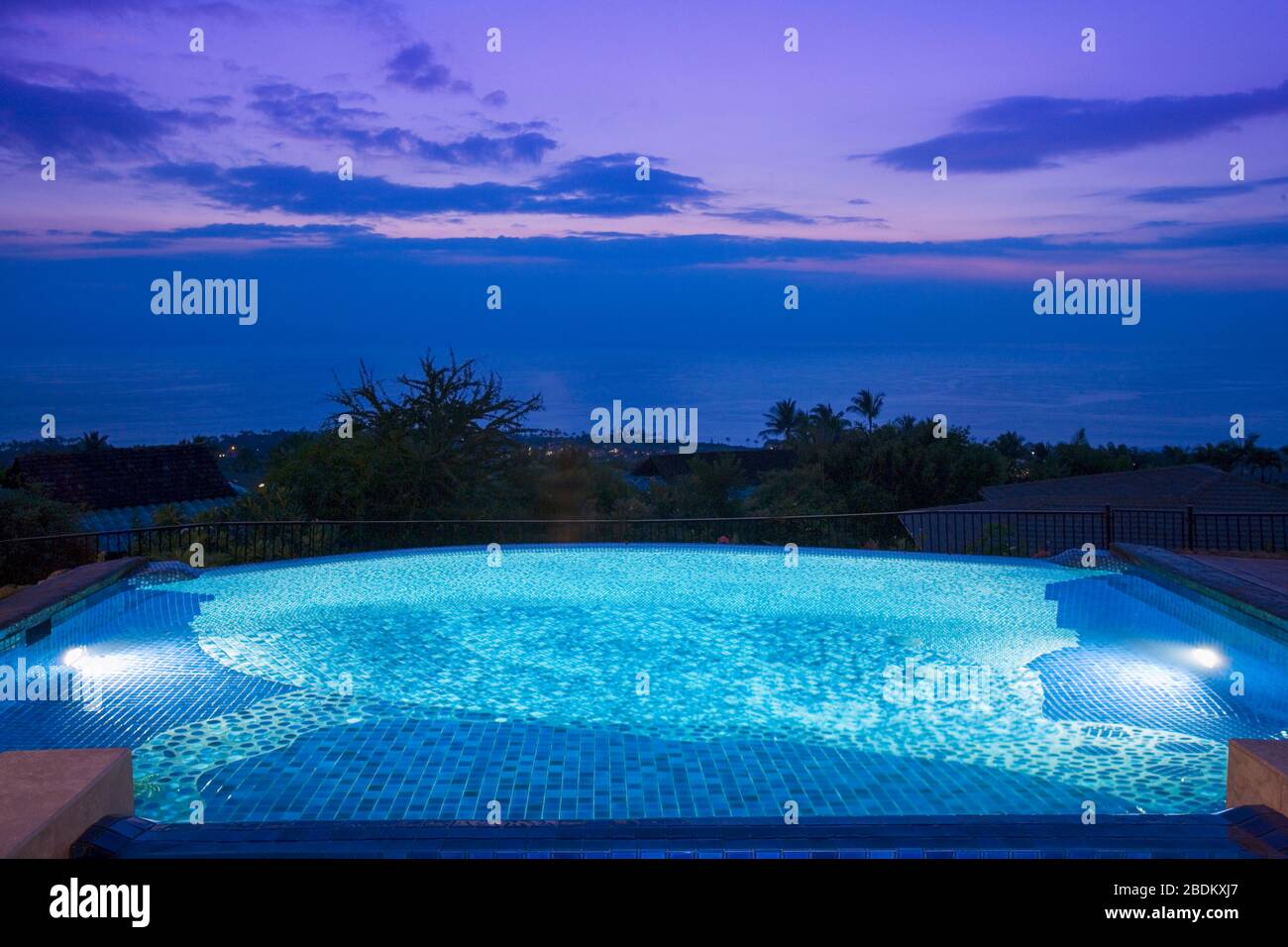 Dusk view of infinity pool at luxury home (property released) on Kona ...