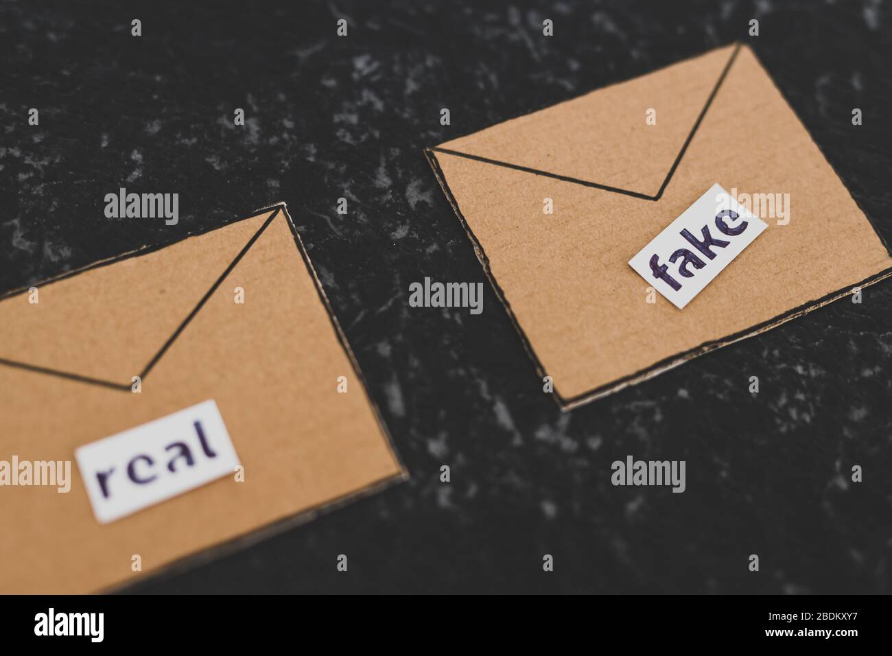 trust-wrothy vs fake emails or online scams concept, email envelop ...