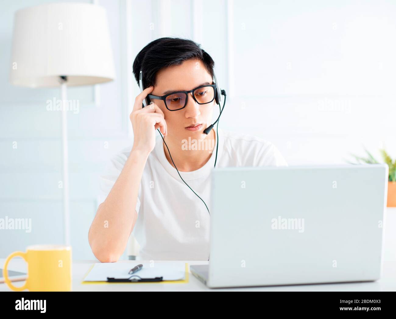 Bored young man home hi-res stock photography and images - Alamy
