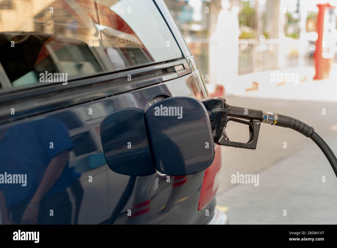 Fill up petrol tank gasoline fuel petrol in car being filled with fuel ...