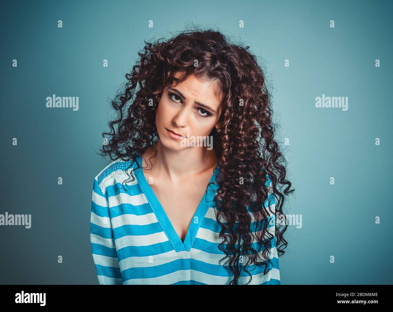 Portrait close up headshot of upset grumpy sad young woman thinking ...