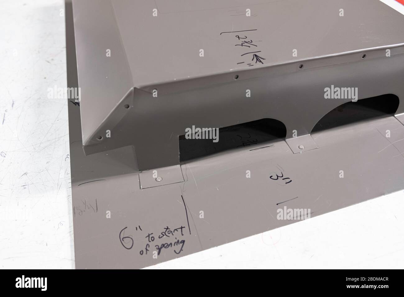 Sheet metal fabricated with measurements written on side Stock Photo ...