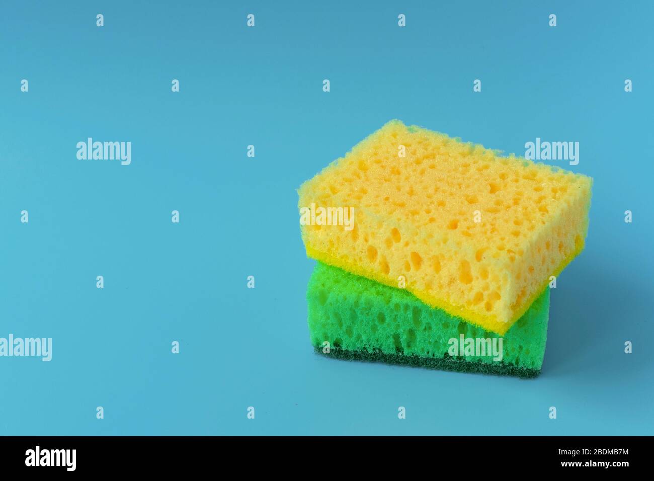 Sponge for washing dishes. Detergent for washing dishes. Spring ...