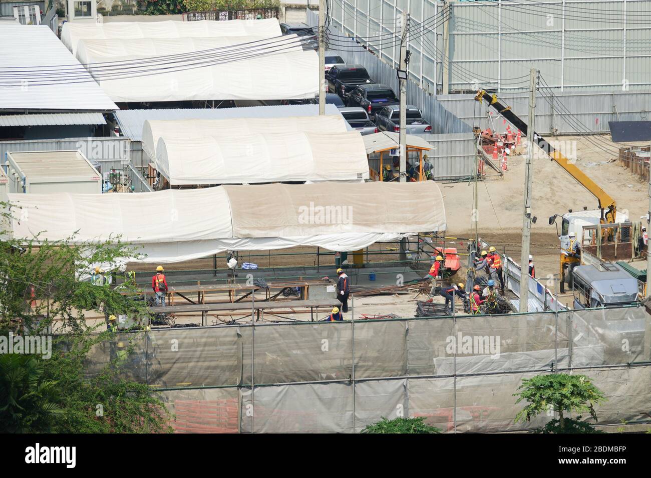 Construction site with manpower working , industry concept Stock Photo ...