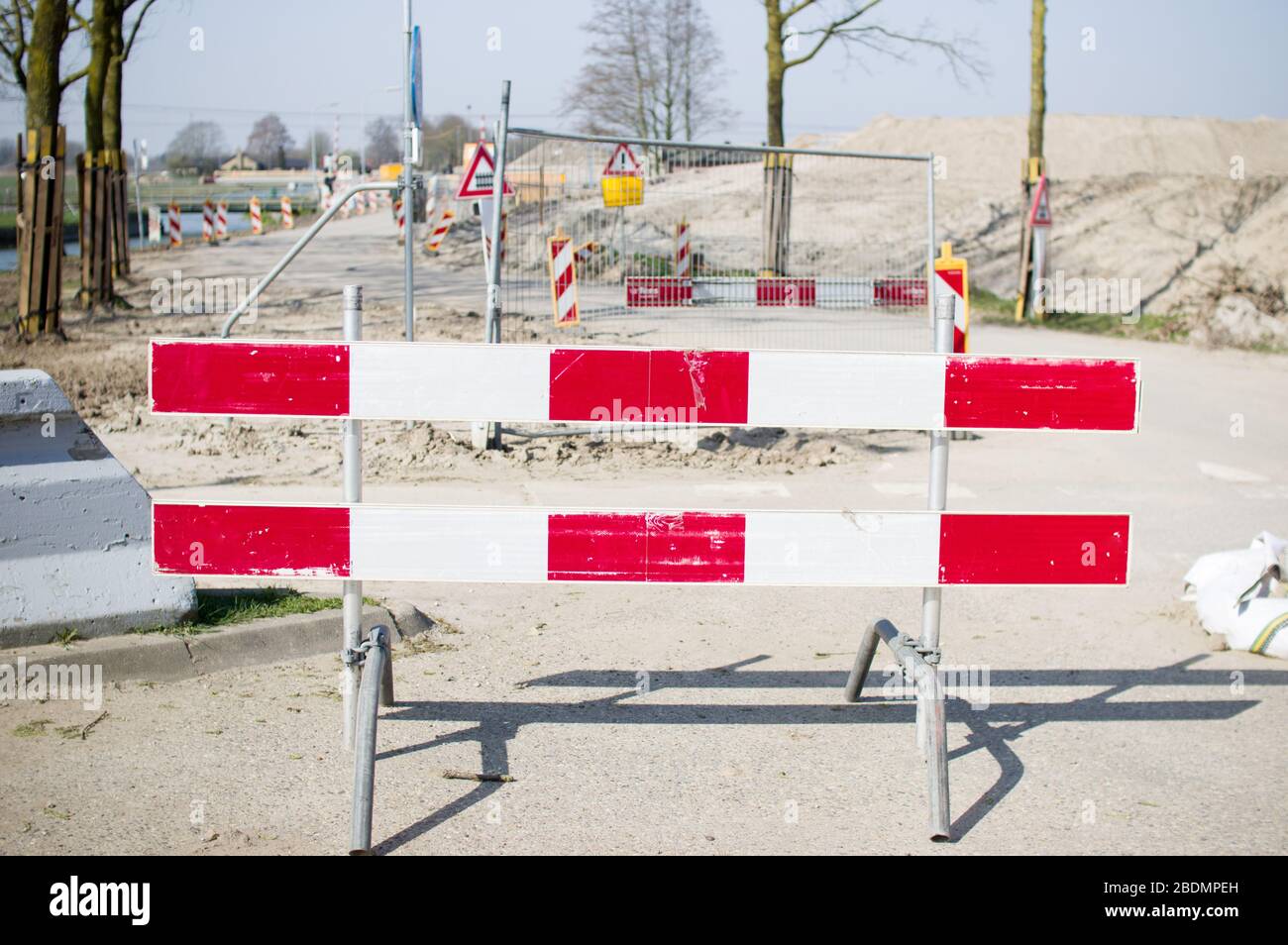 Road closed with barriers for roadworks Stock Photo - Alamy