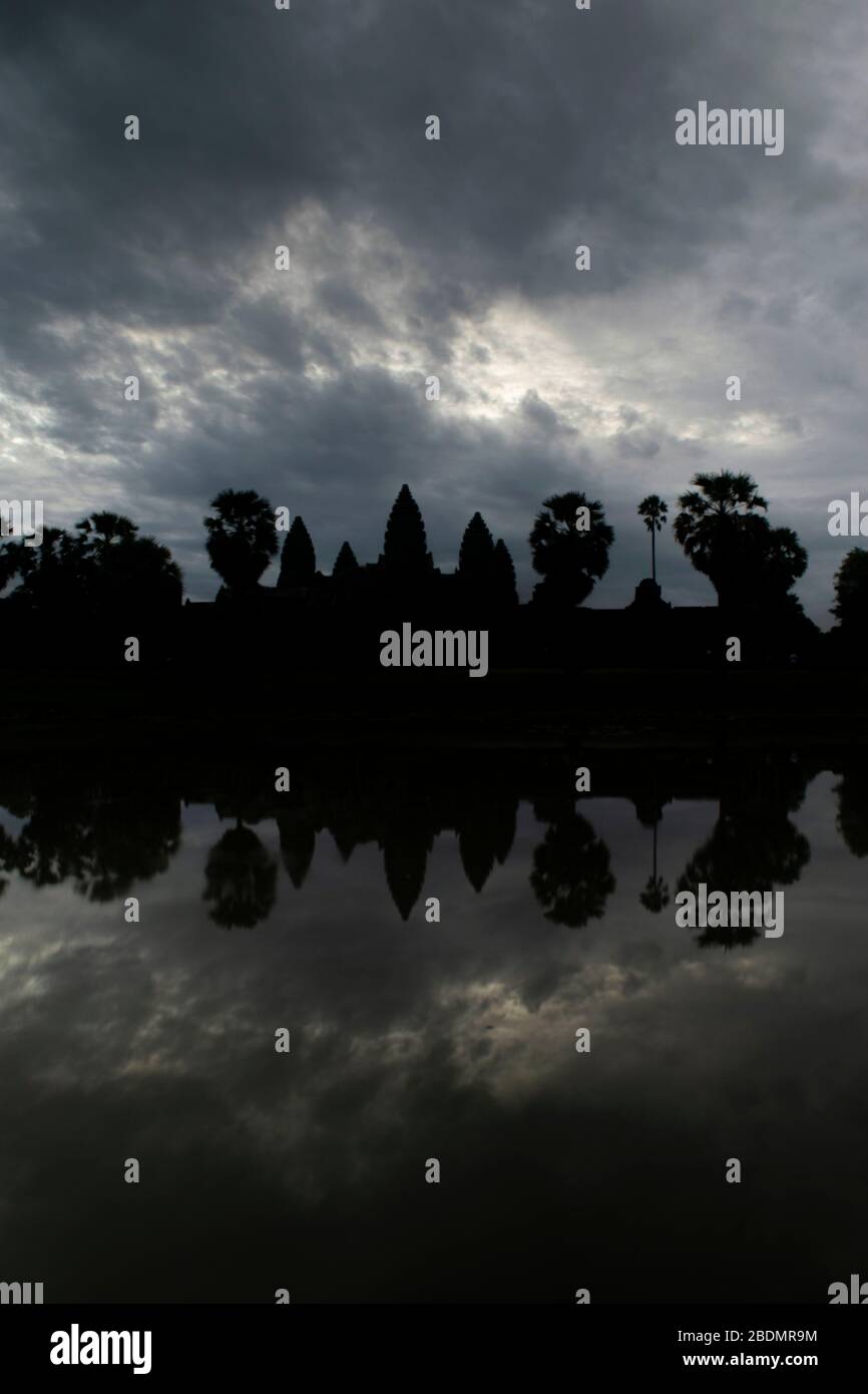 Sunrise over Angkor Wat with lake reflection Stock Photo - Alamy