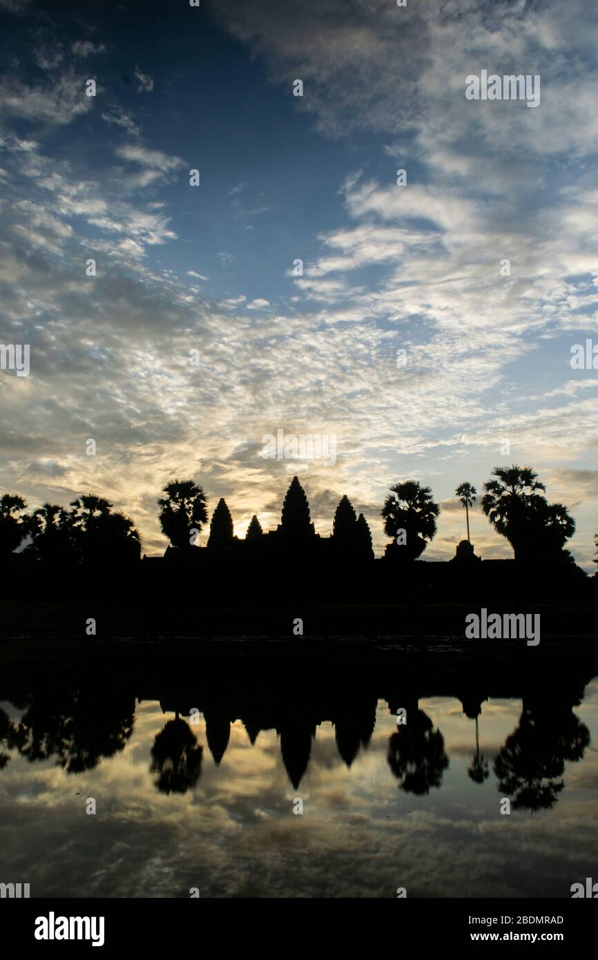 Sunrise over Angkor Wat with lake reflection Stock Photo - Alamy