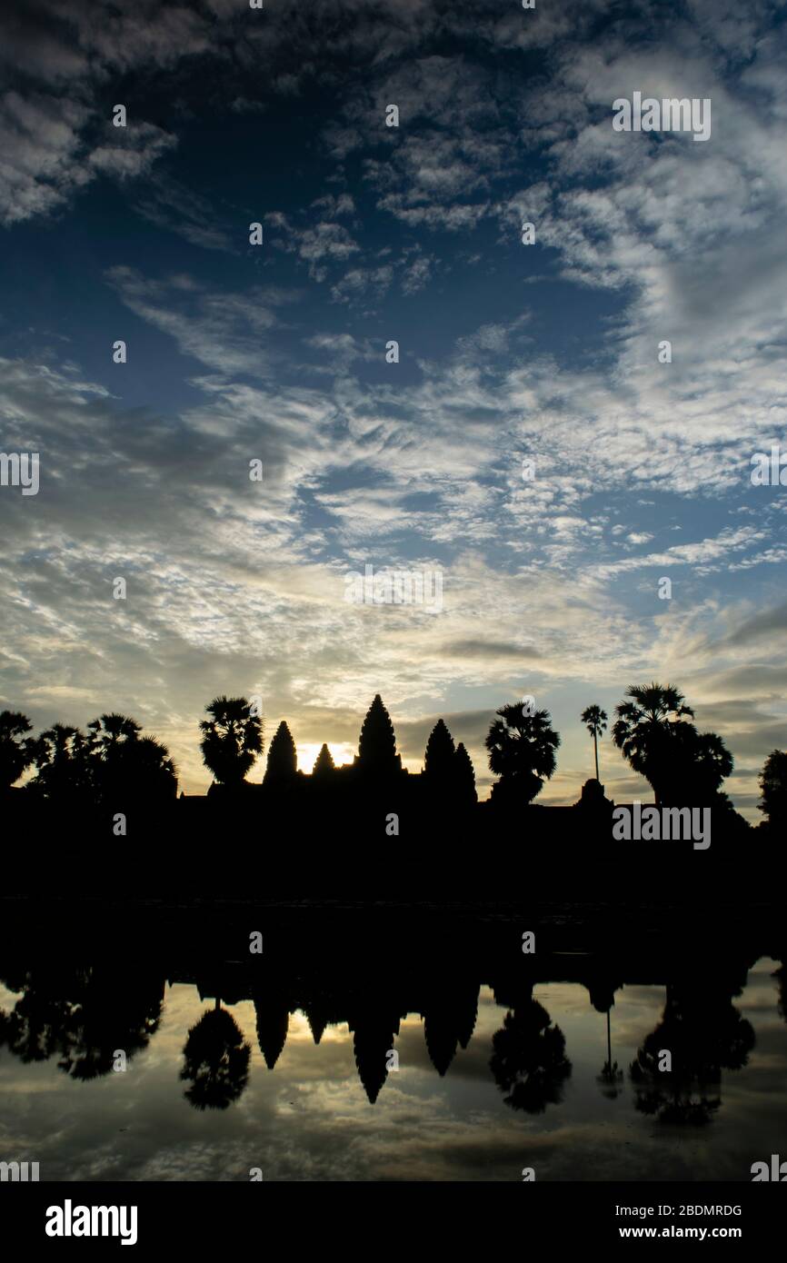 Sunrise over Angkor Wat with lake reflection Stock Photo - Alamy