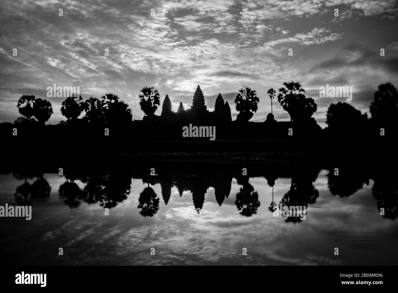 Sunrise over Angkor Wat with lake reflection Stock Photo - Alamy