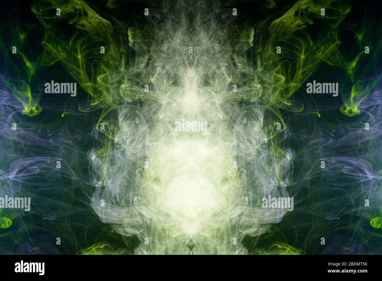 Smoke of pattern green and blue in the form of horror monster on a dark ...