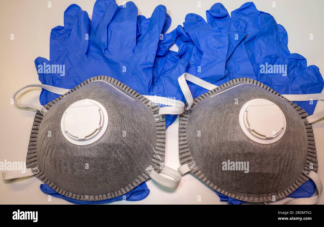 Set of FFP2 medical masks and disposable blue medical gloves. Face mask ...
