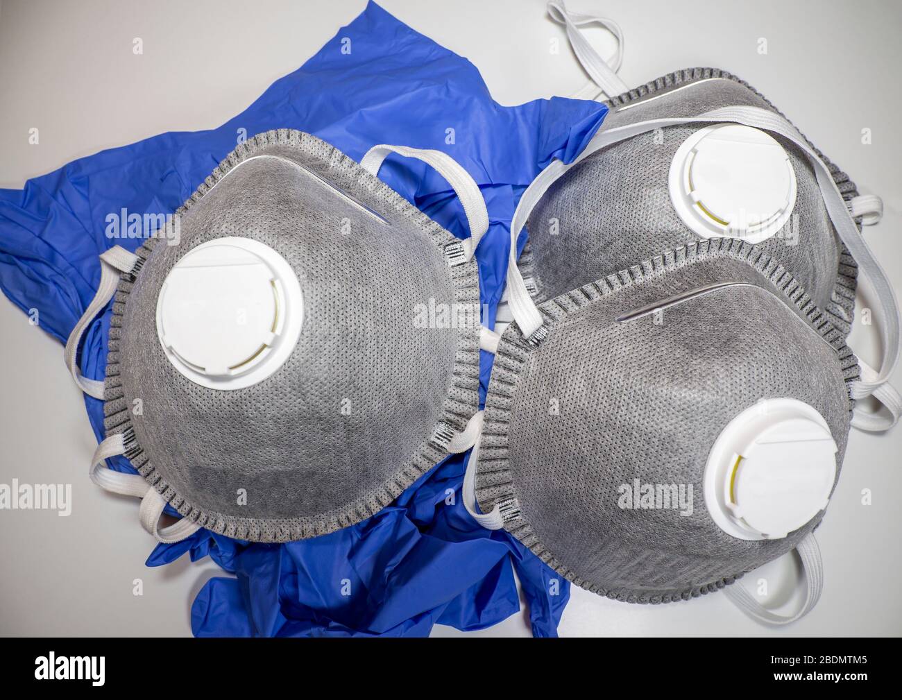 Set of FFP2 medical masks and disposable blue medical gloves. Face mask ...