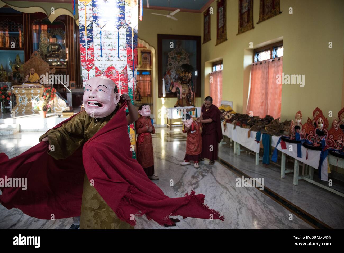 Tibetan monks preparing for Cham dance, performed during Losar (Tibetan ...