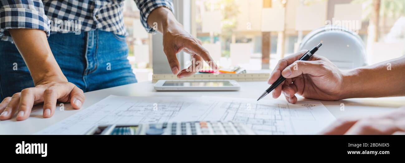 engineer Hand Drawing Plan On Blue Print with architect equipment ...