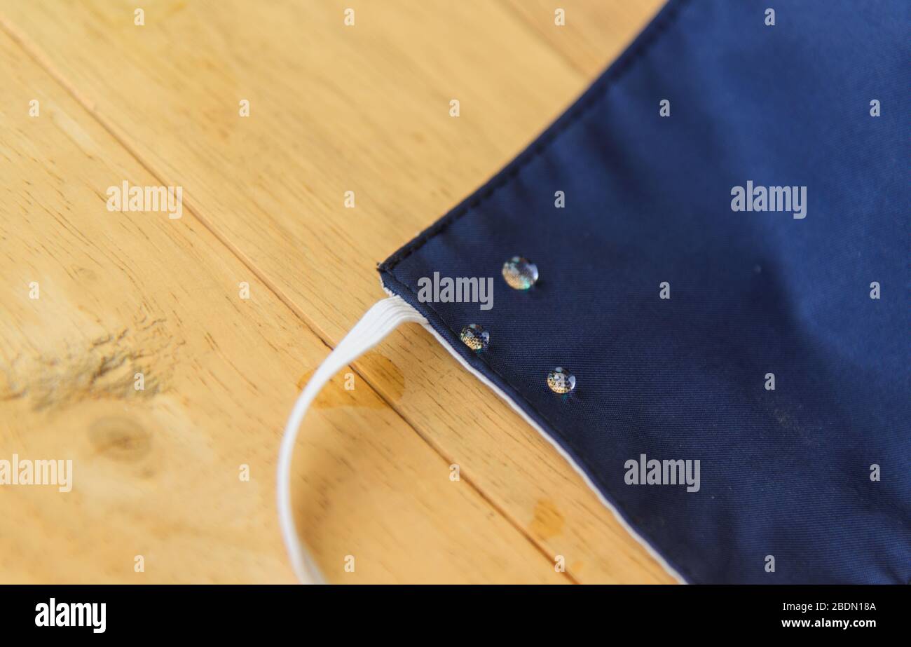 Water drop cloth mask protect hi-res stock photography and images - Alamy
