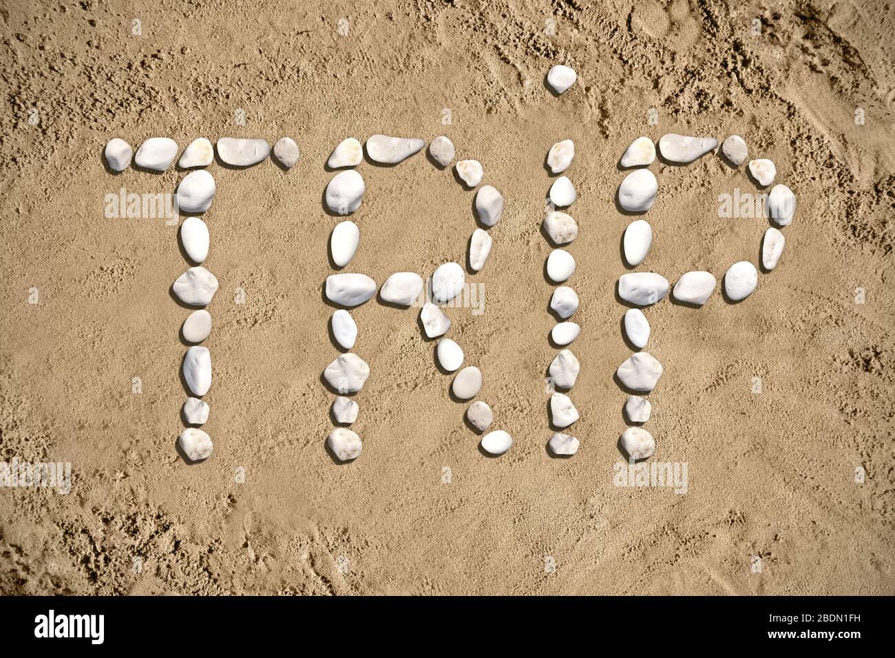 Trip - beach, sand, stones Stock Photo - Alamy
