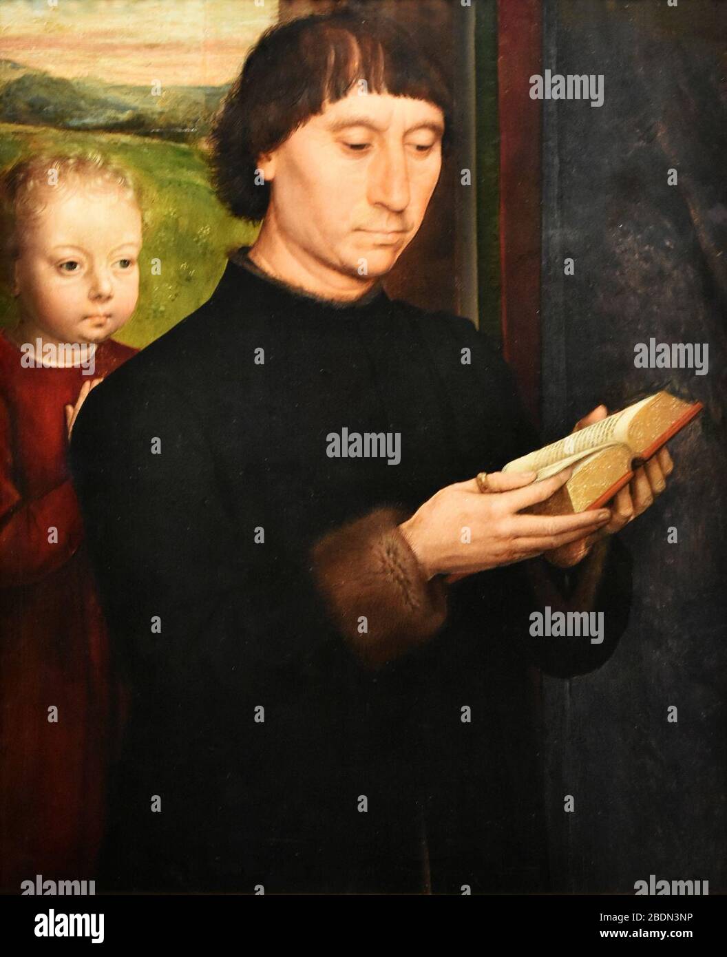 Hans Memling (ca.1430of40-1494) Biddende man met zijn overleden zoon ...