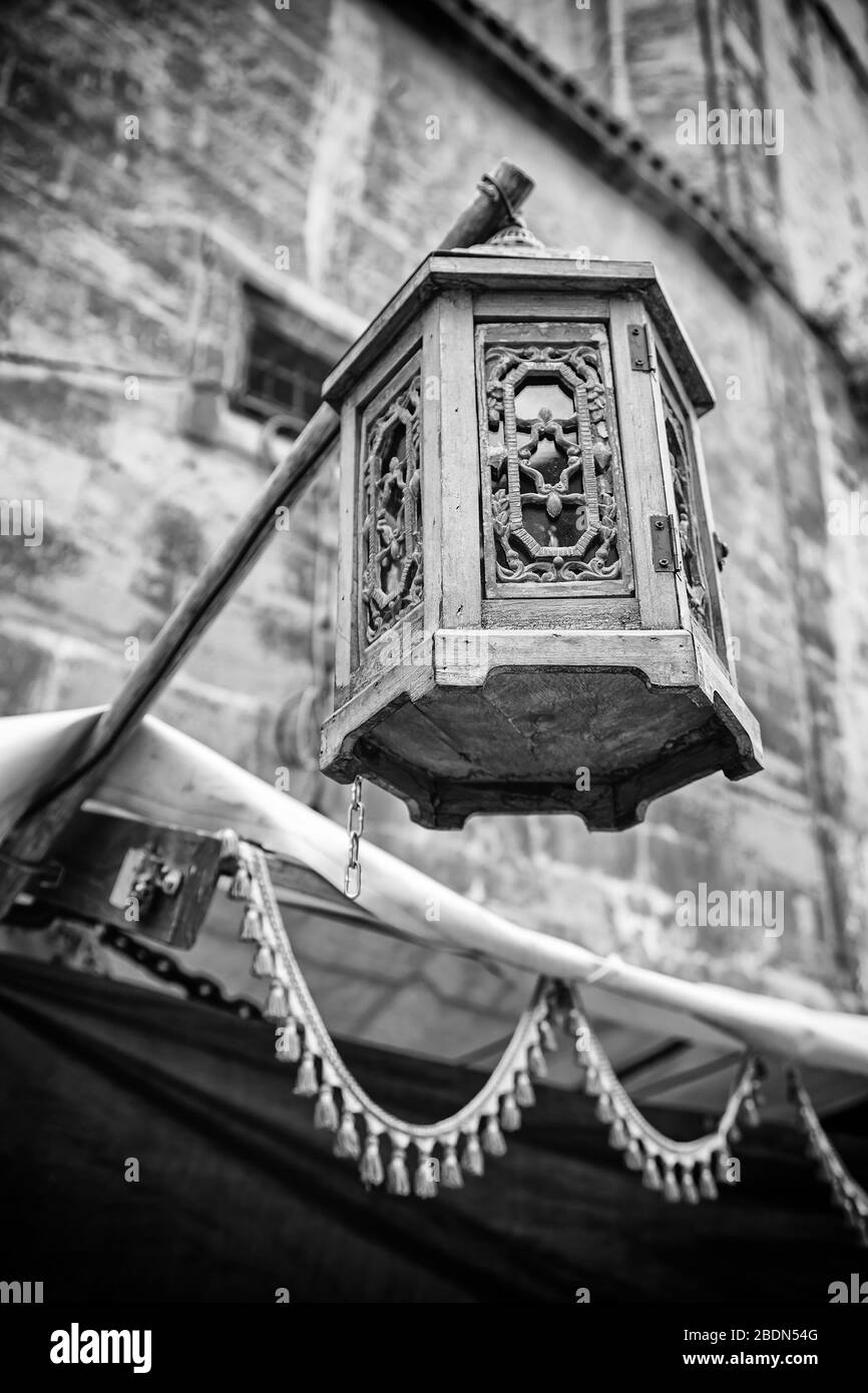 Medieval wooden lamp, detail of old medieval decoration, lighting ...