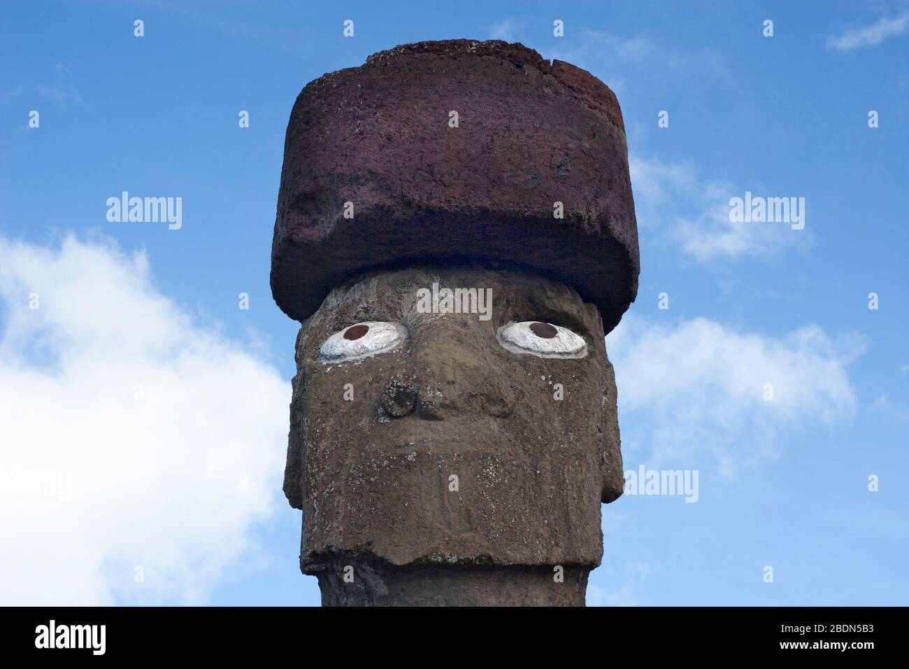 Moai head with restored eyes and pukao carved from red scoria in Ahu Ko ...