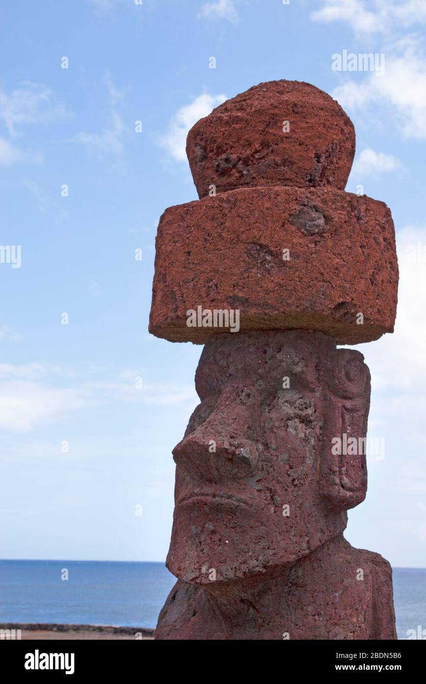 Moai head with pukao carved from red scoria Stock Photo - Alamy