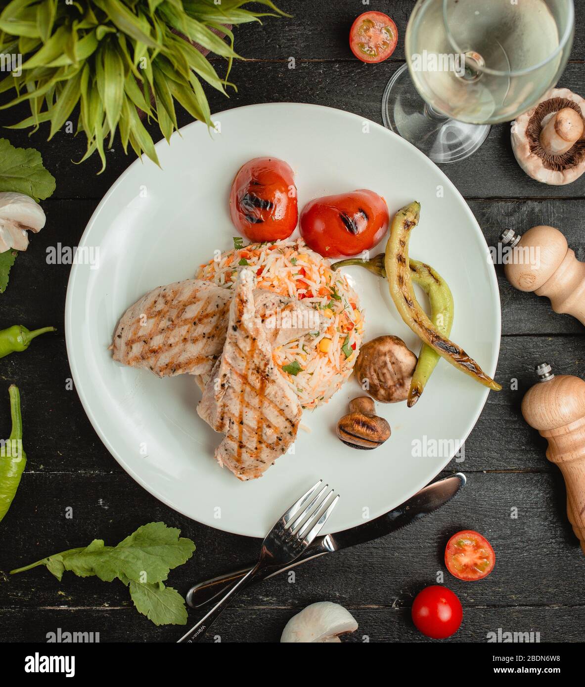 chicken steak with rice and vegetables Stock Photo - Alamy