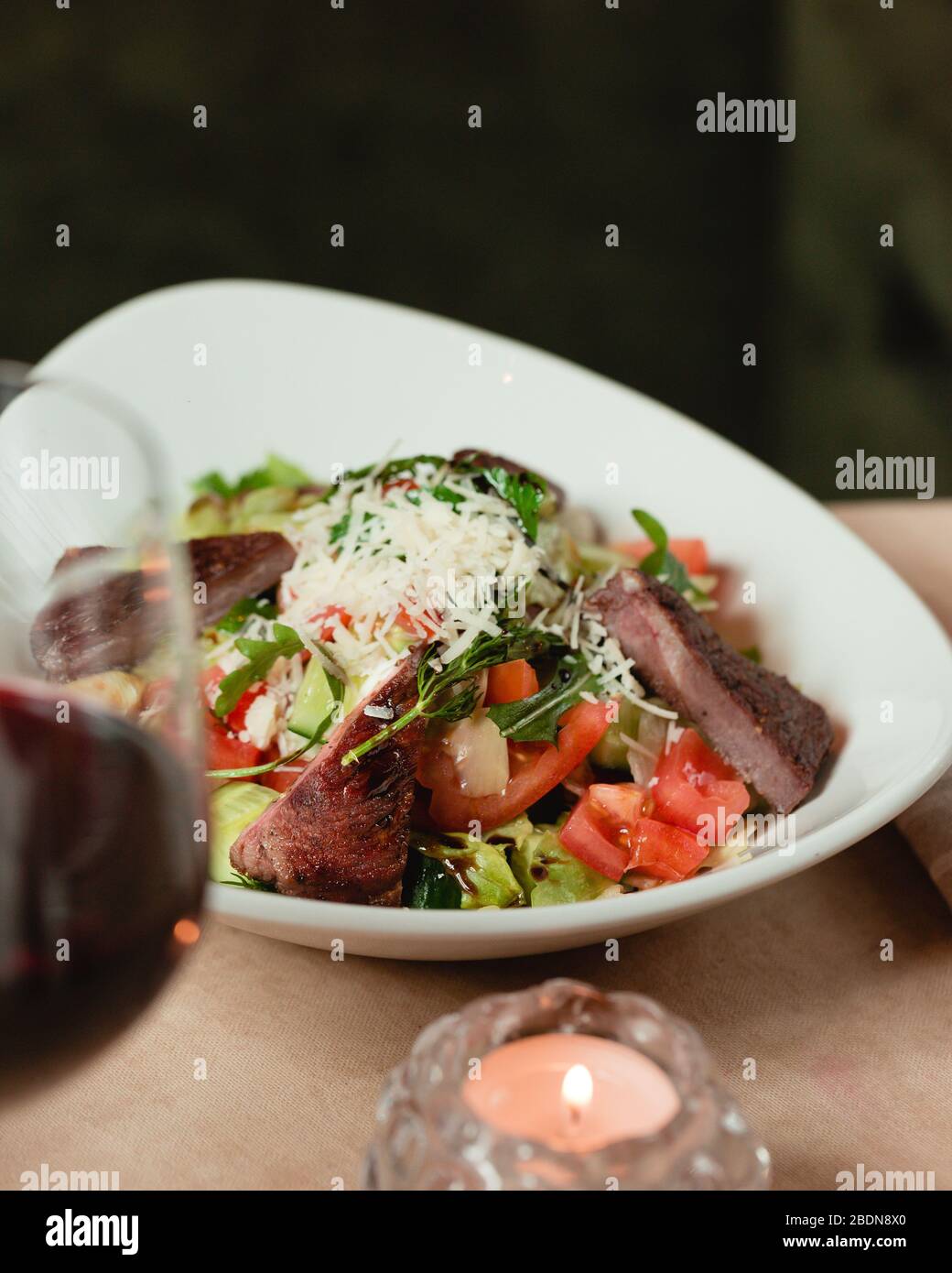salad with meat and grated cheese Stock Photo - Alamy