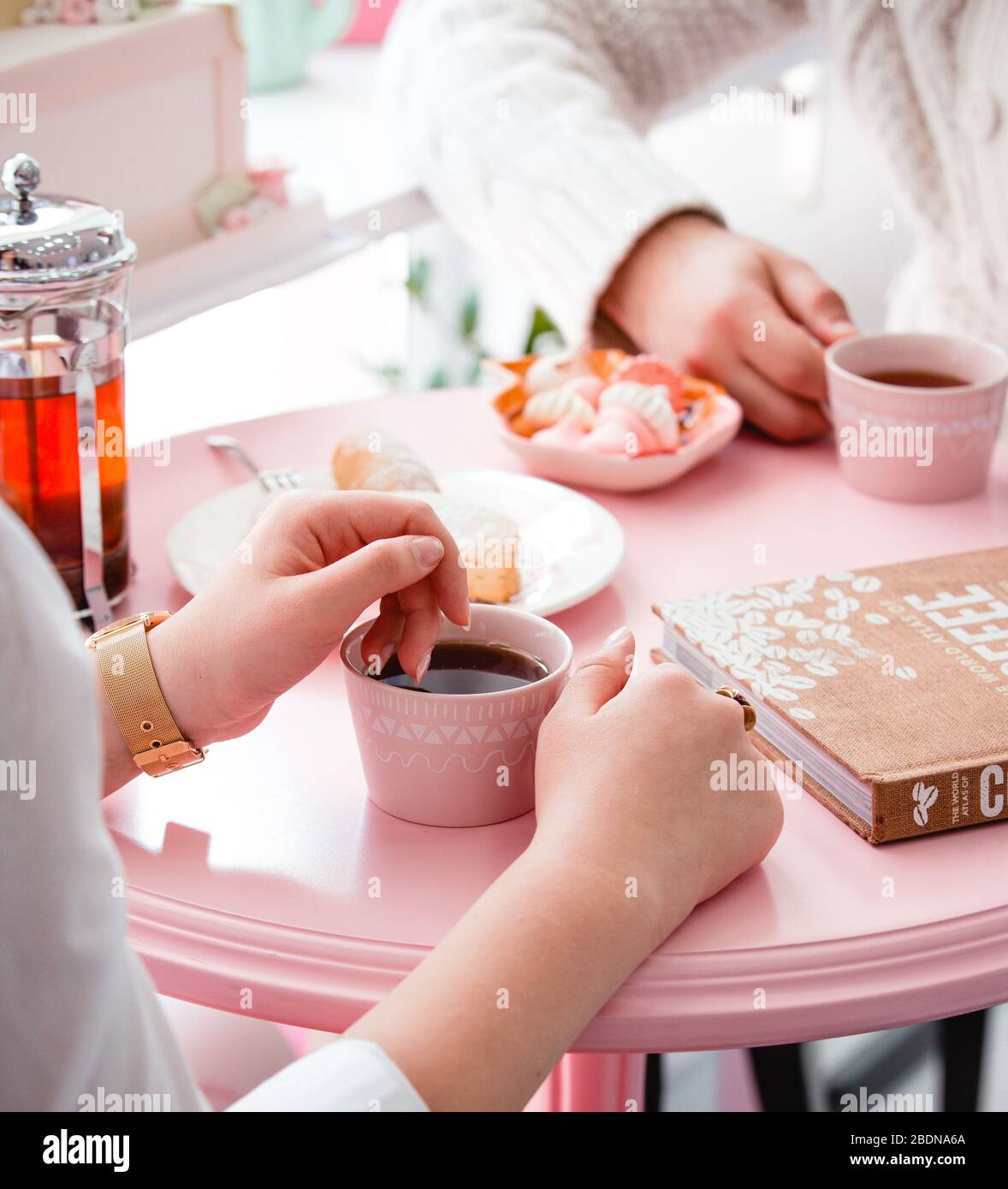 couple have tea with sweets Stock Photo - Alamy