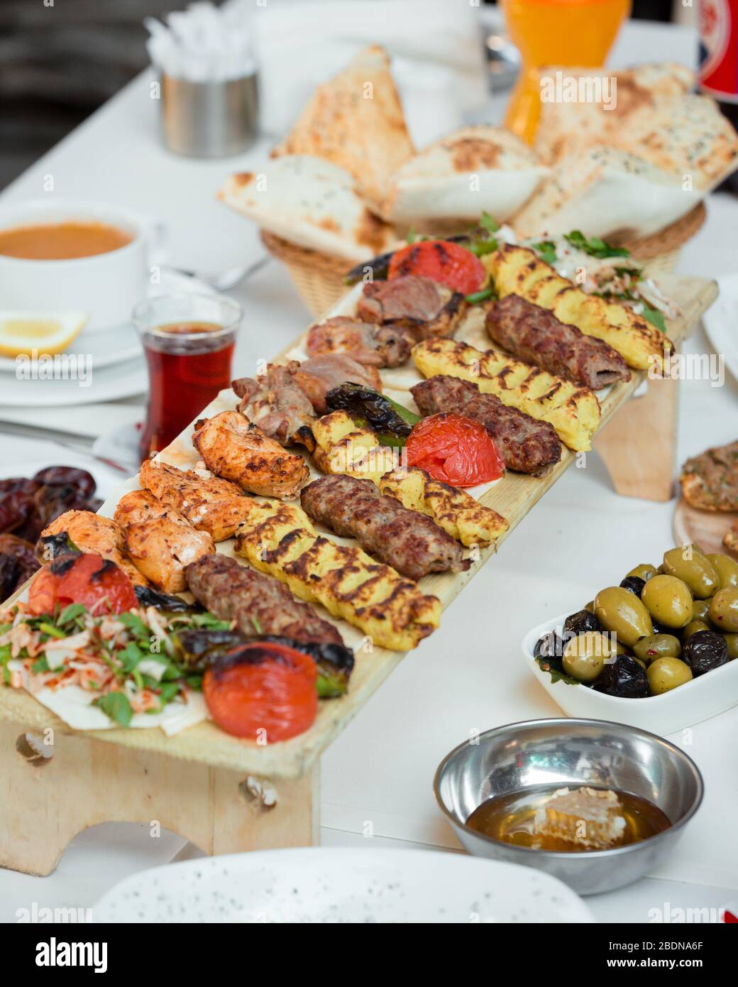 different types of kabab served with grilled vegetables Stock Photo - Alamy