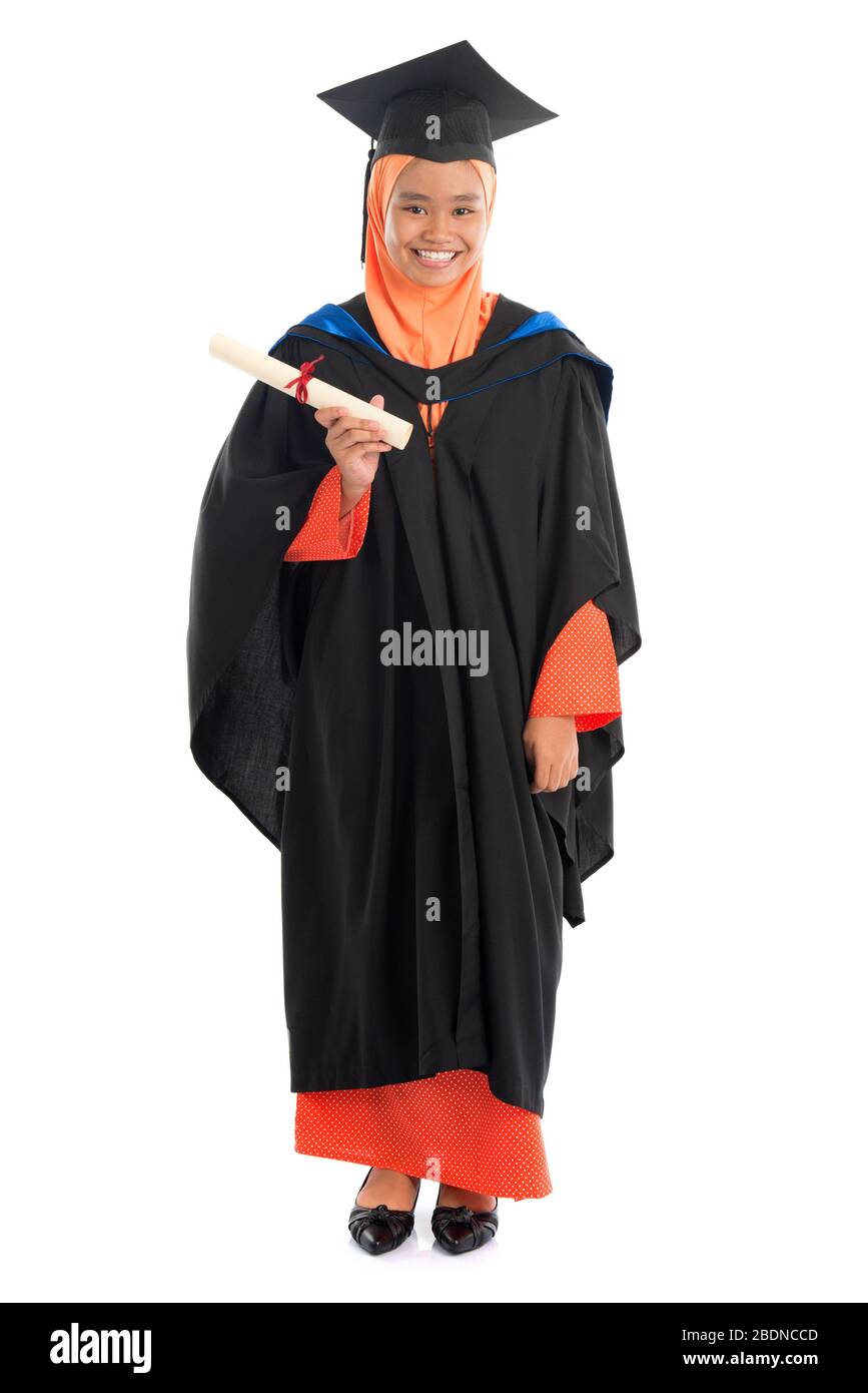 Full body female student in graduation gown, standing isolated white ...