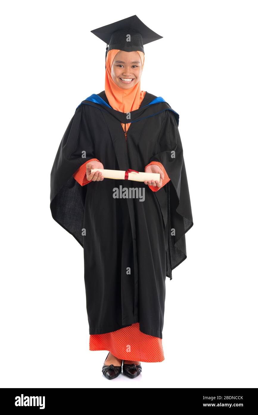 Full body female student in graduation gown, standing isolated white ...