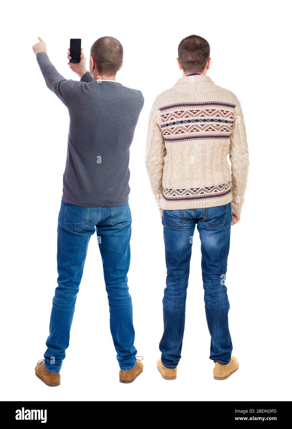 back view of two man with shopping bags. backside view of person. Rear ...