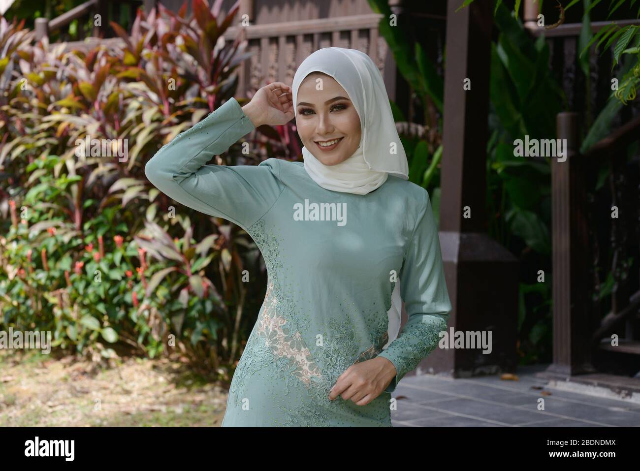 Portrait of Muslim girl in hijab, smiling at outdoor, traditional ...