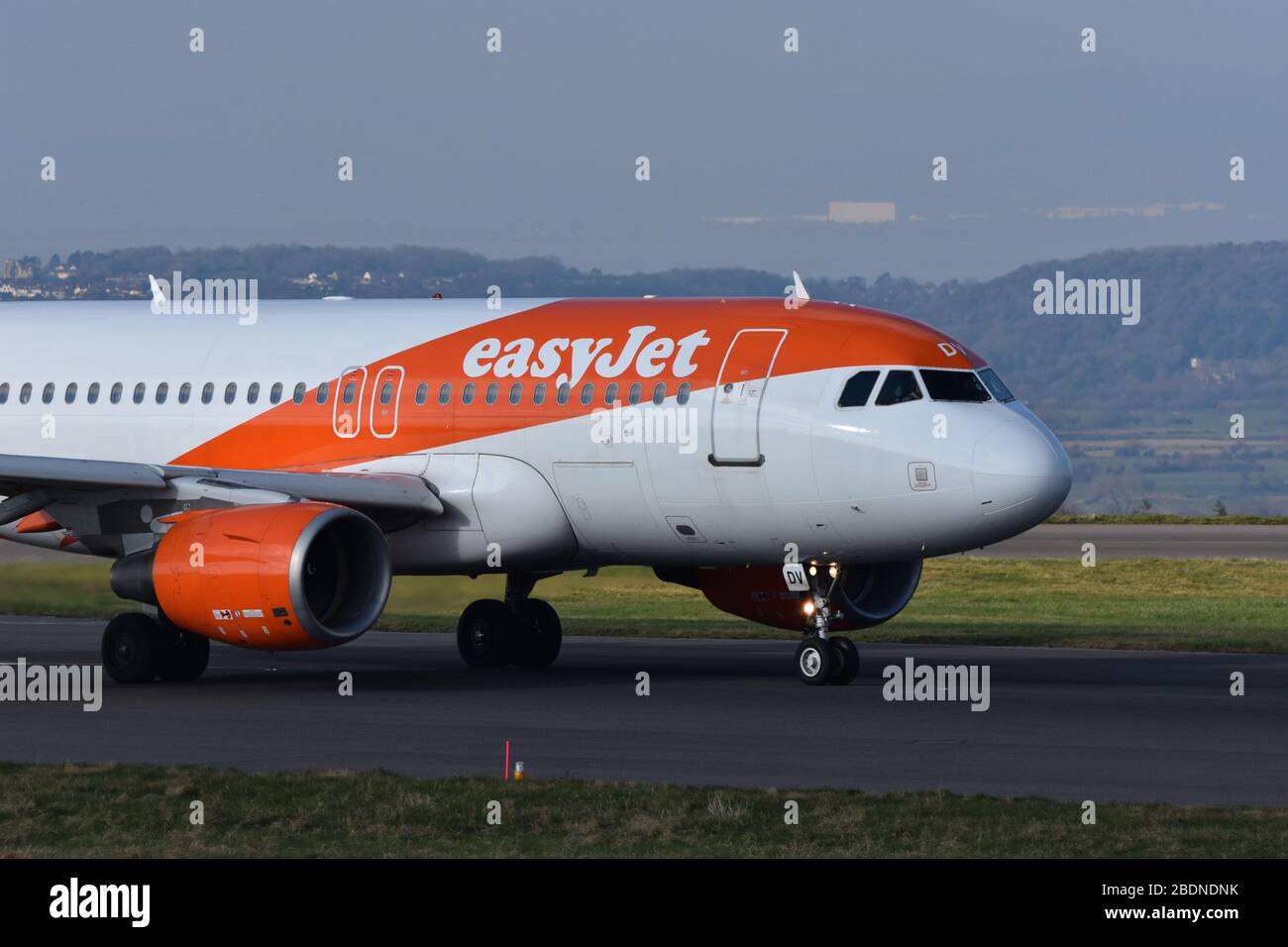 The front end (cockpit) of an easyJet aeroplane on the runway at ...