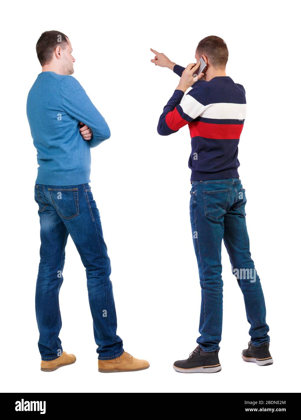 back view of two man with shopping bags. backside view of person. Rear ...