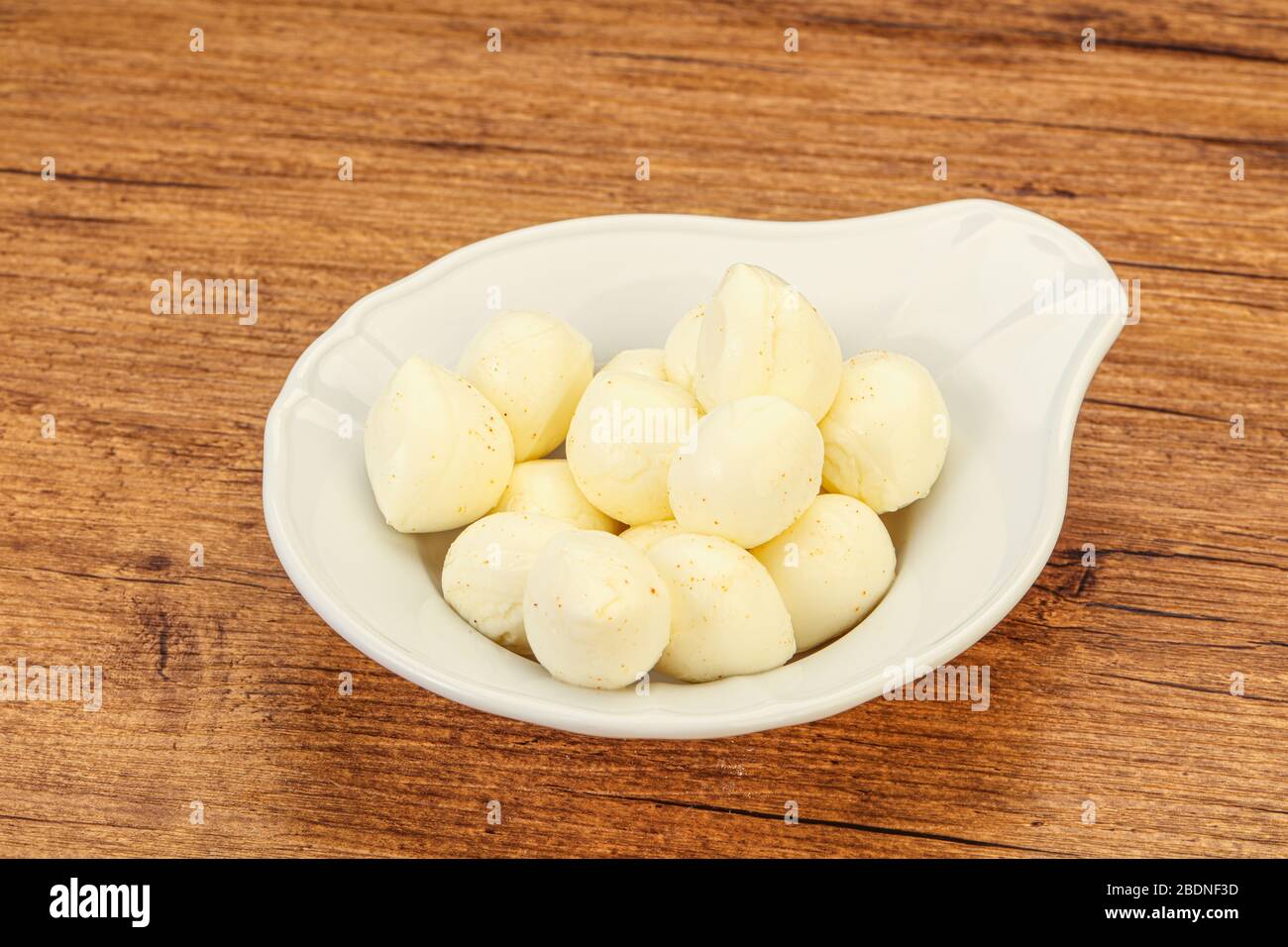 Natural tasty baby Mozarella cheese in the bowl Stock Photo - Alamy