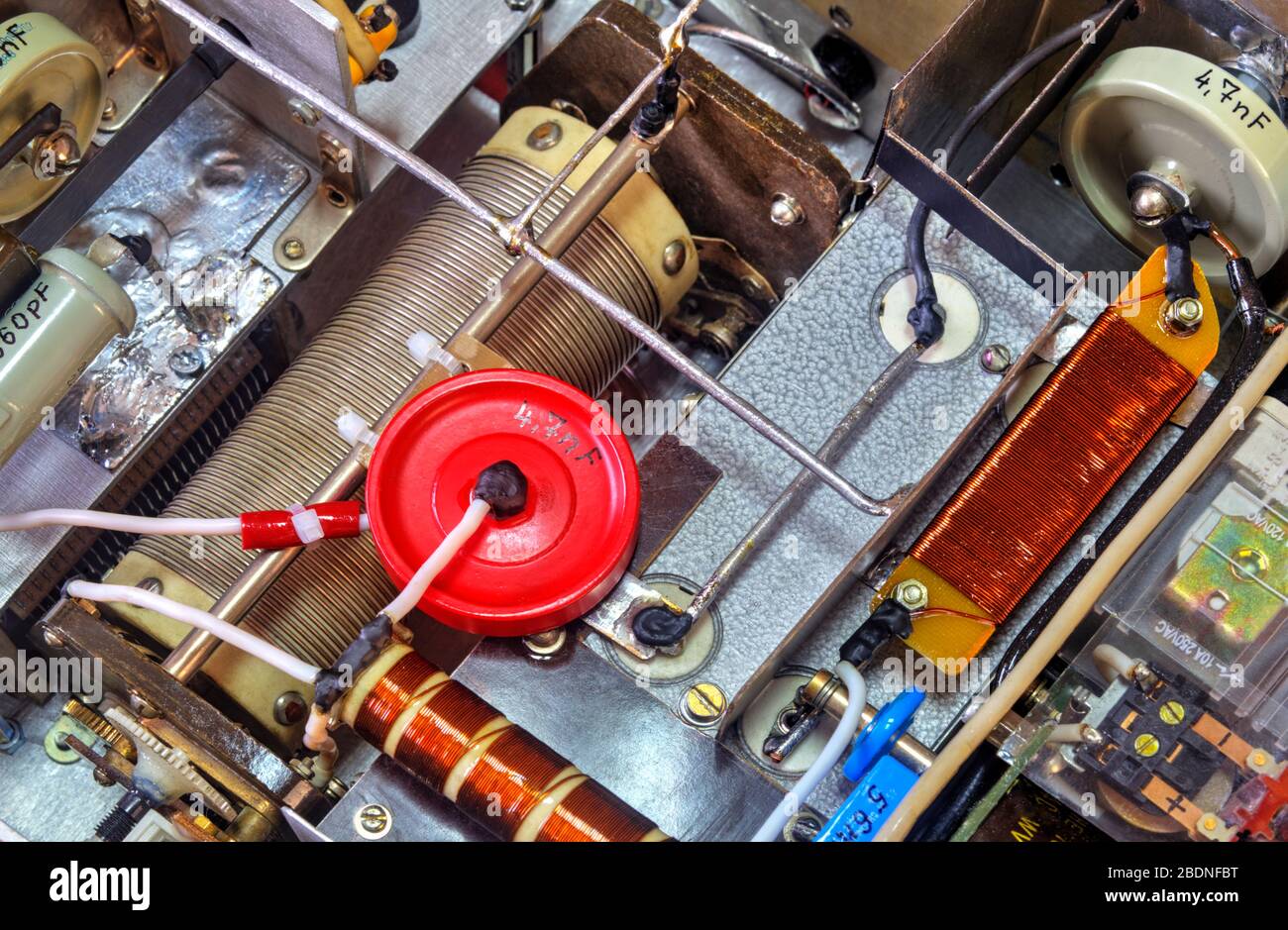 Inside view of high frequency power amplifier with capacitors, coils ...