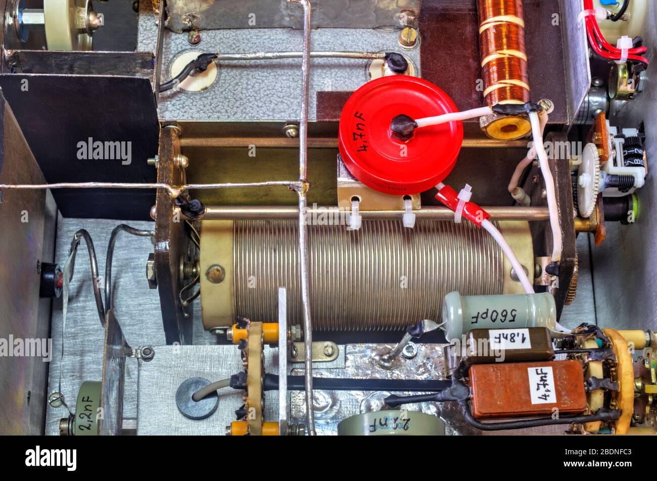 Inside view of high frequency power amplifier with capacitors, coils ...