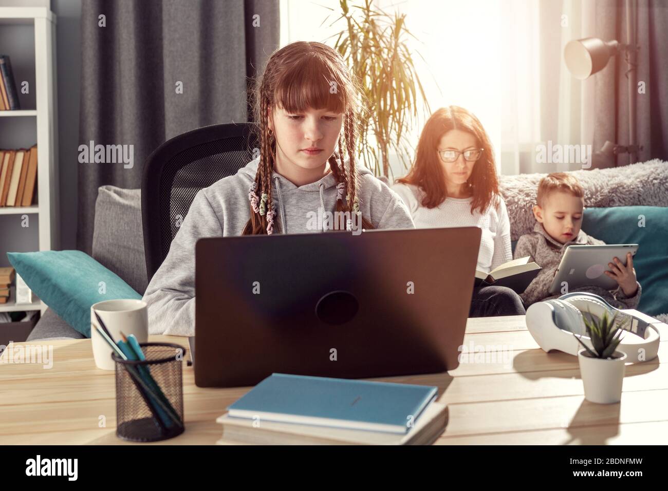 Family members doing their stuff Stock Photo - Alamy