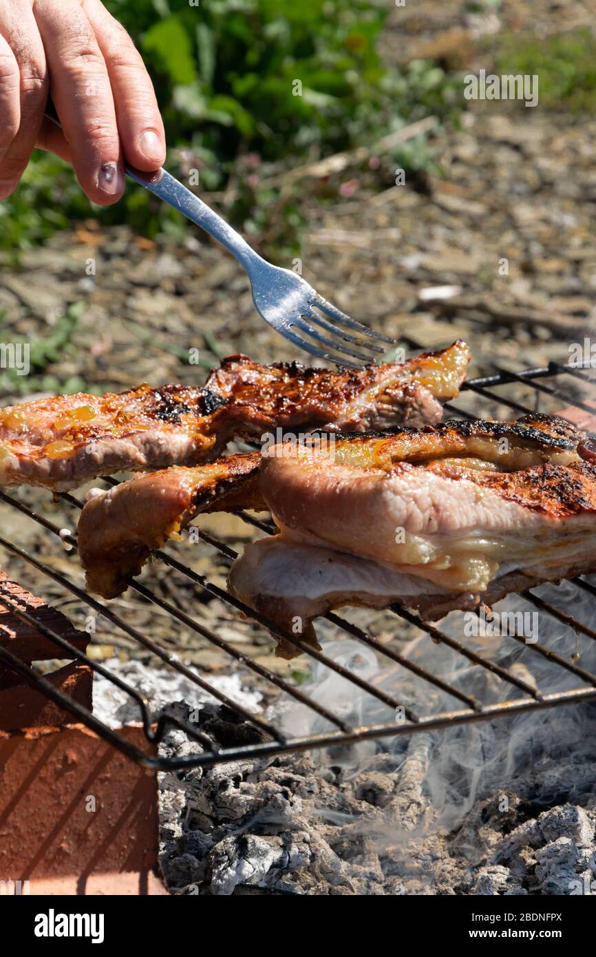 Grill ribs hand hi-res stock photography and images - Alamy