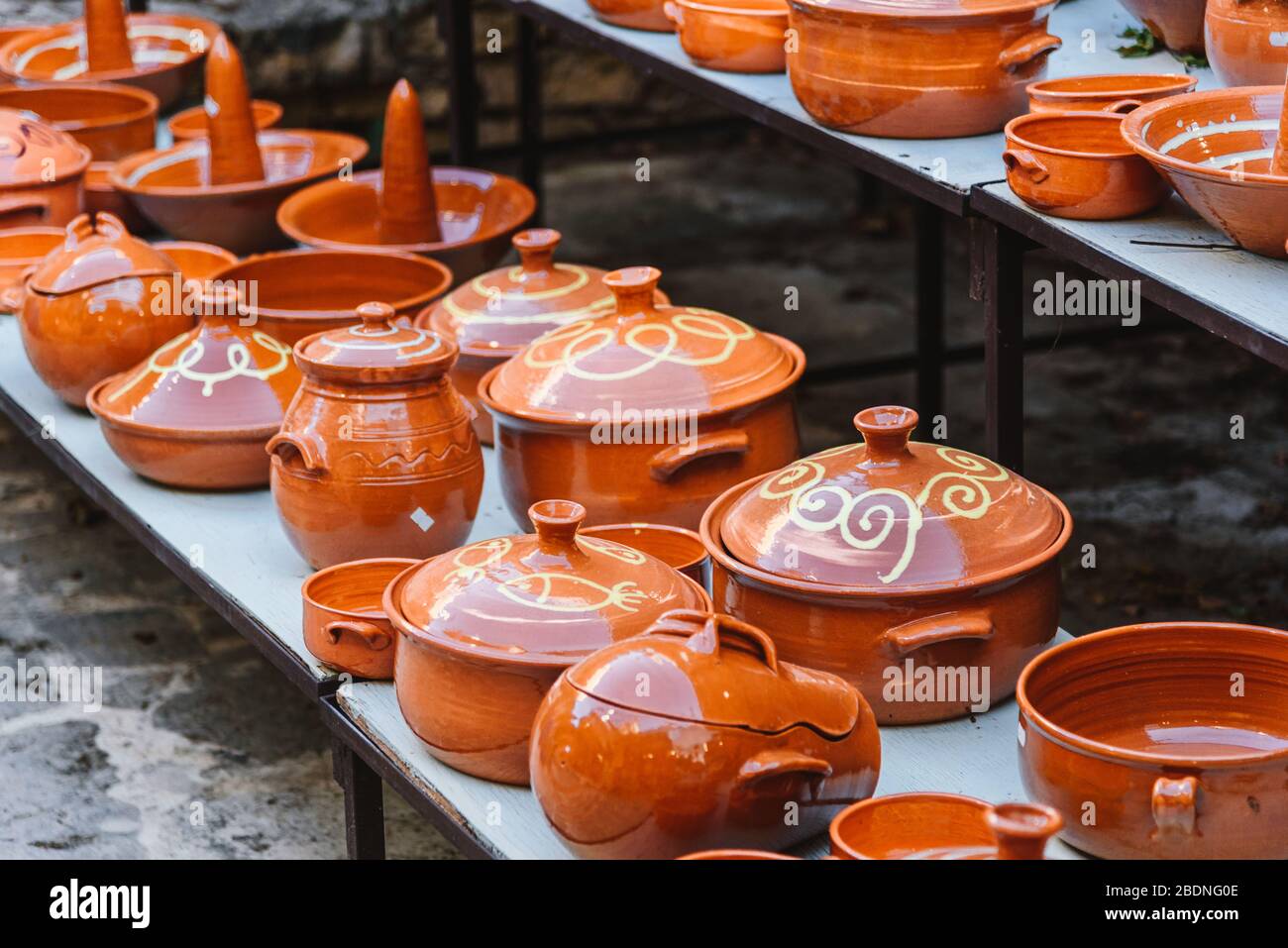 Beautiful handmade cooking pots. Ceramics / pottery objects Stock Photo ...